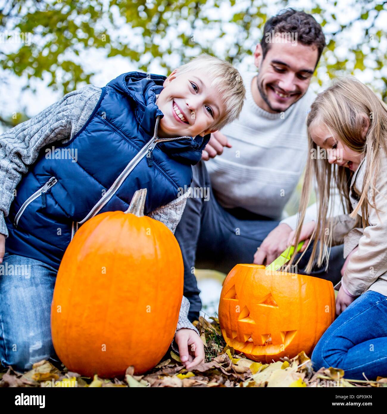 Carving Pumpkin Family High Resolution Stock Photography and Images - Alamy