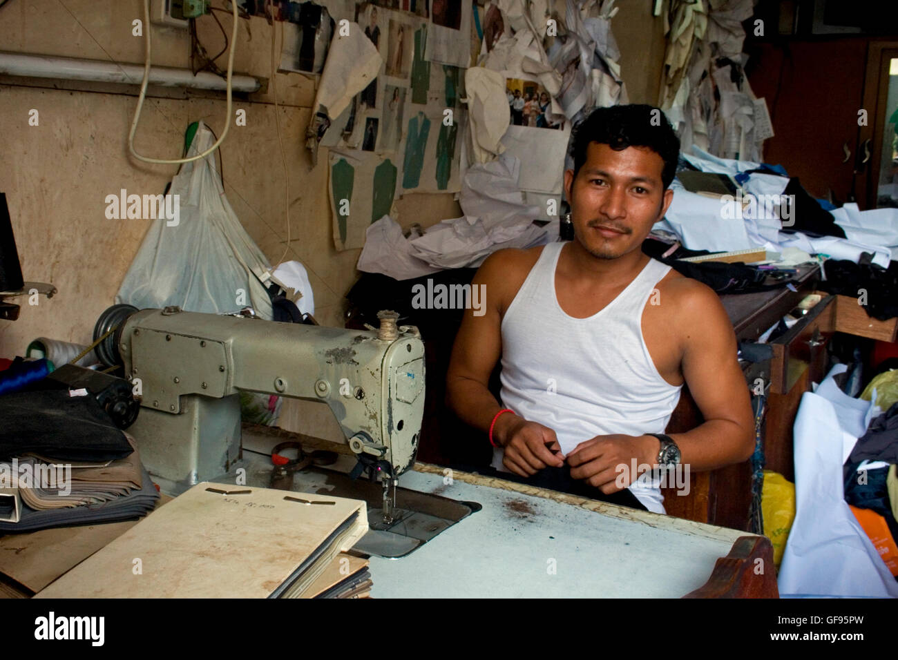 Man sewing hi-res stock photography and images - Alamy