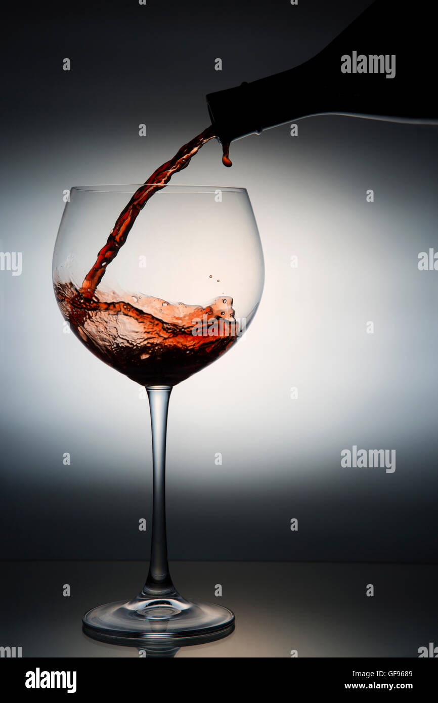 backlit portrait of red wine in tasting glass Stock Photo - Alamy