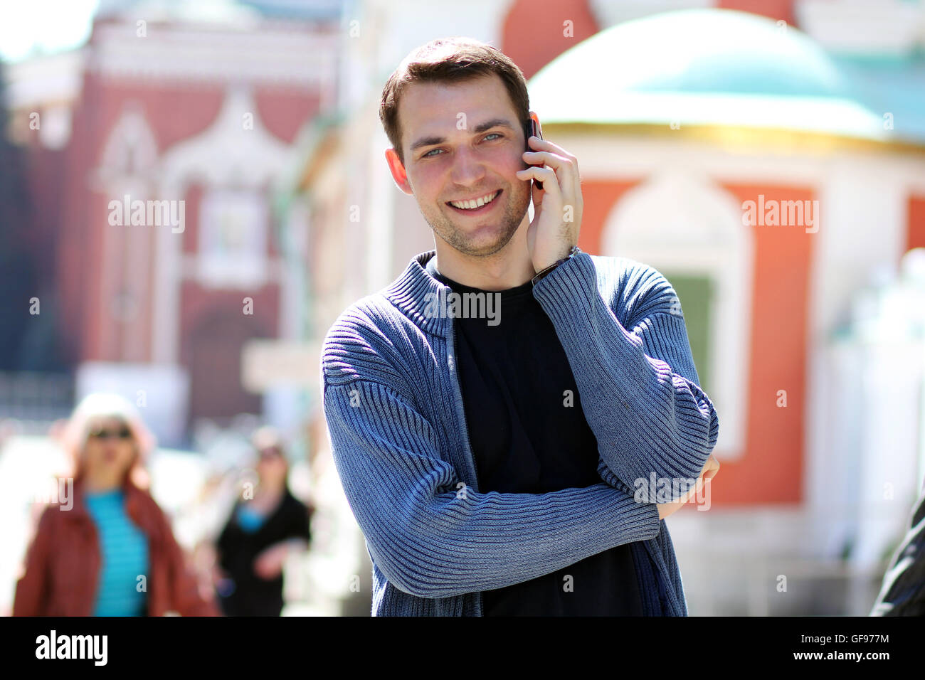 happy men calling by phone Stock Photo - Alamy