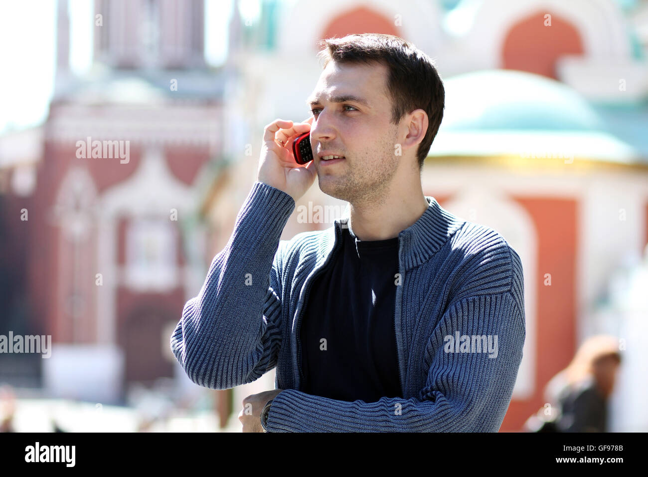 happy men calling by phone Stock Photo - Alamy