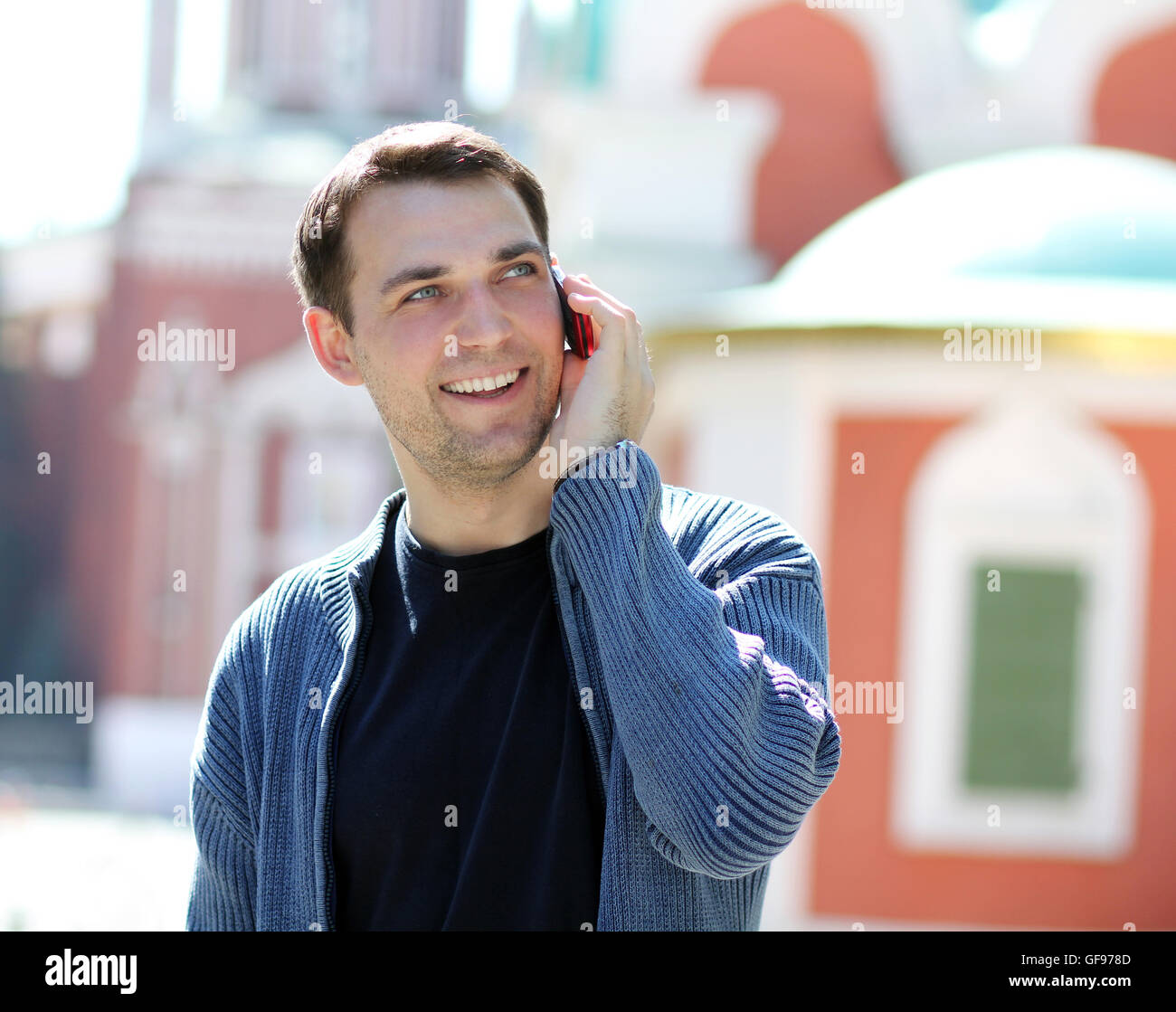 happy men calling by phone Stock Photo - Alamy
