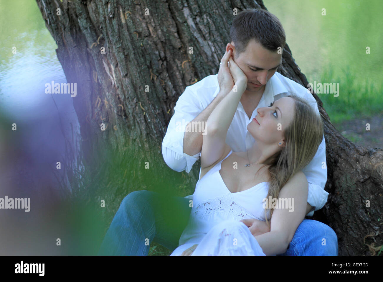 Portrait of love couple embracing outdoor Stock Photo - Alamy