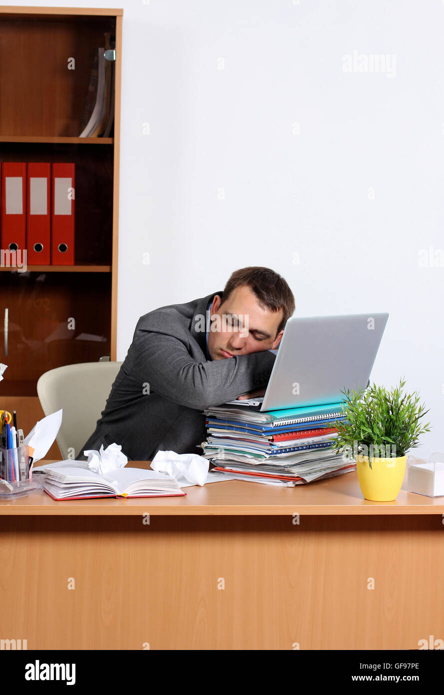 office worker, a man sleeping on the job Stock Photo - Alamy