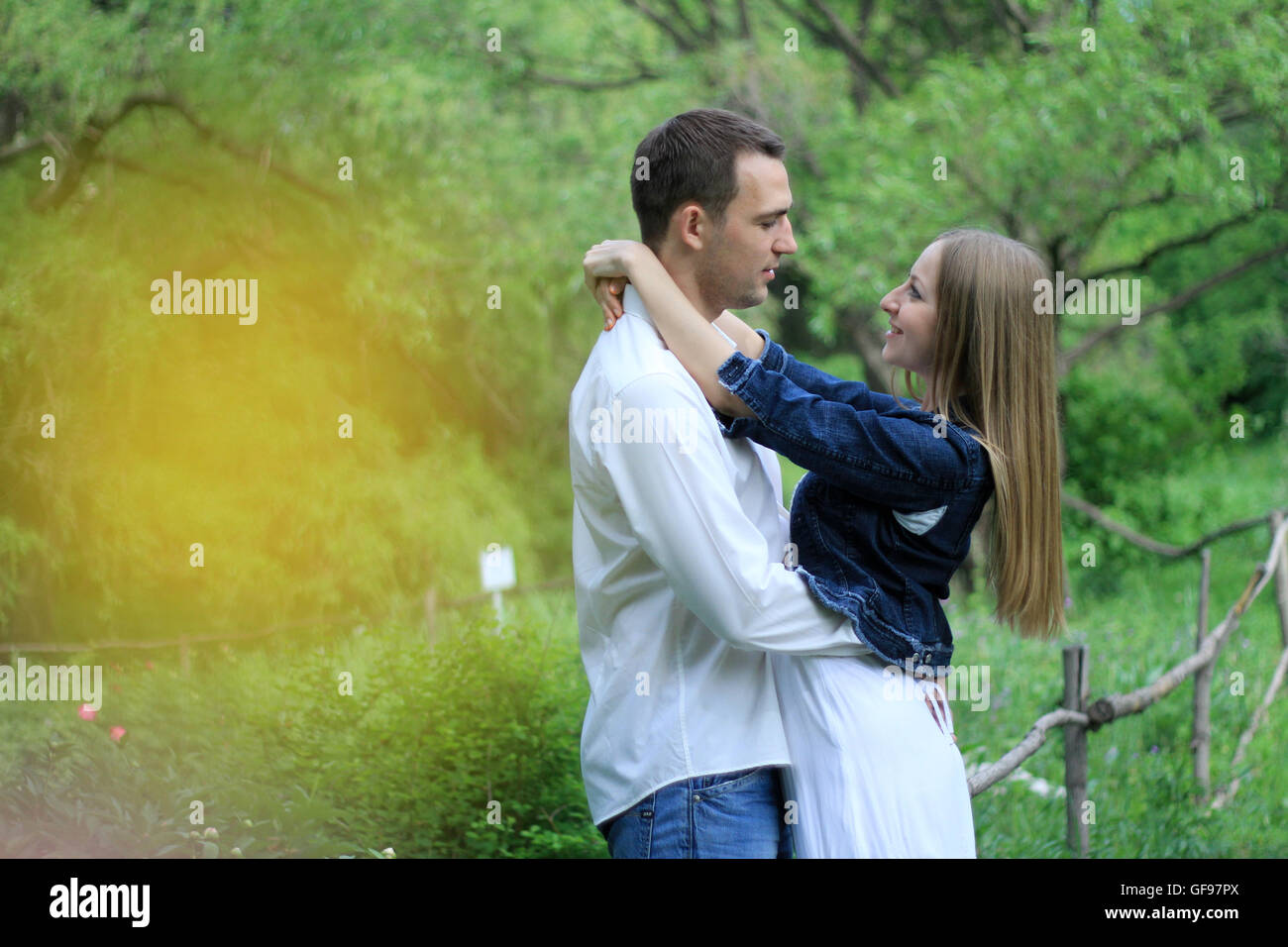 Portrait of love couple embracing outdoor Stock Photo - Alamy
