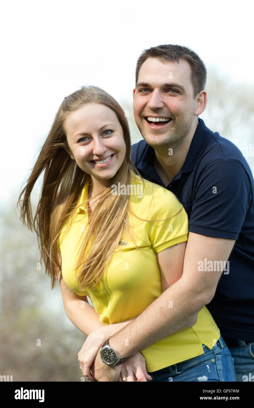 Portrait of love couple embracing outdoor Stock Photo - Alamy