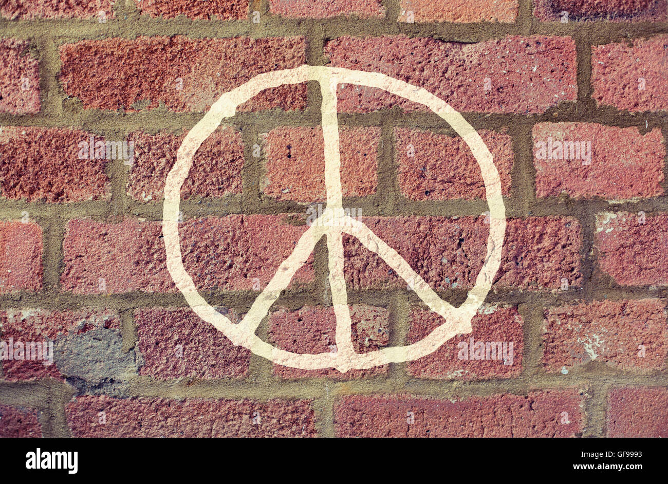 Peace sign graffiti on brick wall hi-res stock photography and images ...