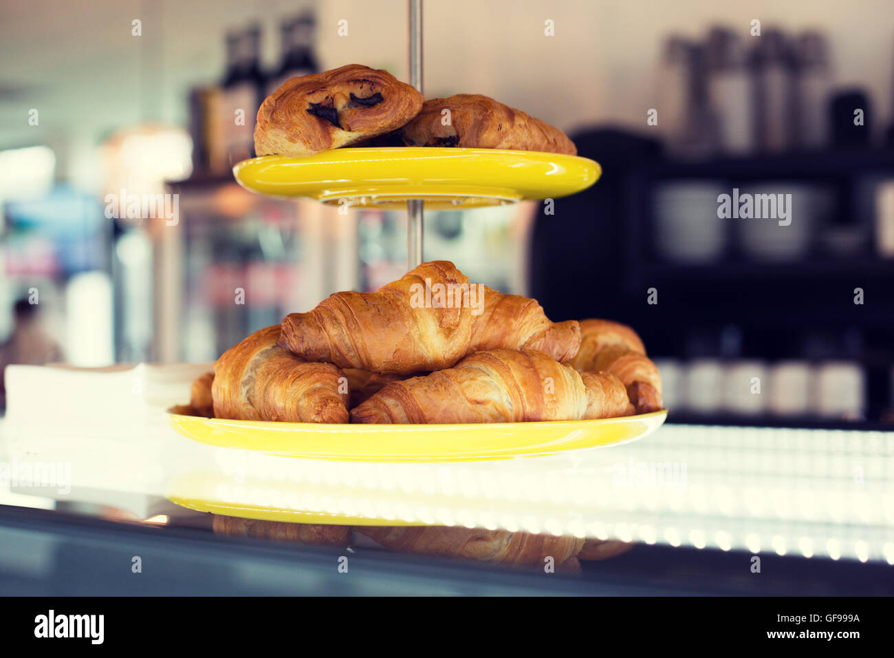 close up of croissants and buns on cake stand Stock Photo - Alamy