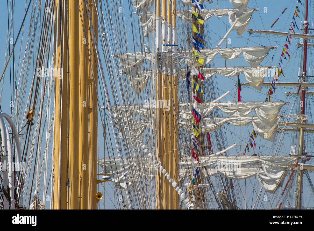 Details of masts, topsails, rigging and flags of the tall ships at ...