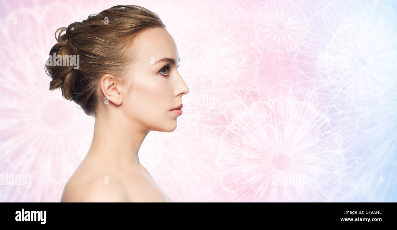 beautiful young woman face over white background Stock Photo - Alamy