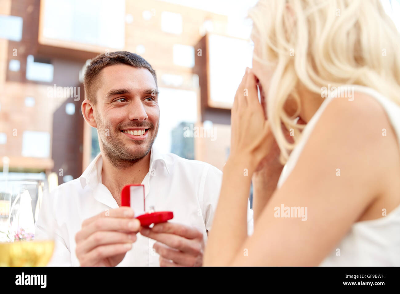 man with engagement ring making proposal to woman Stock Photo - Alamy