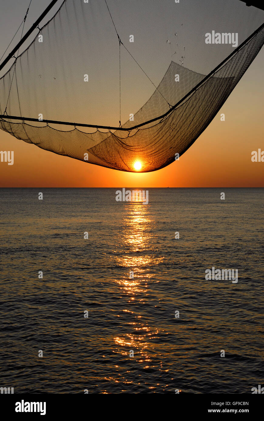 Sunset on fishing net carrelet in France, activity typical of the ...