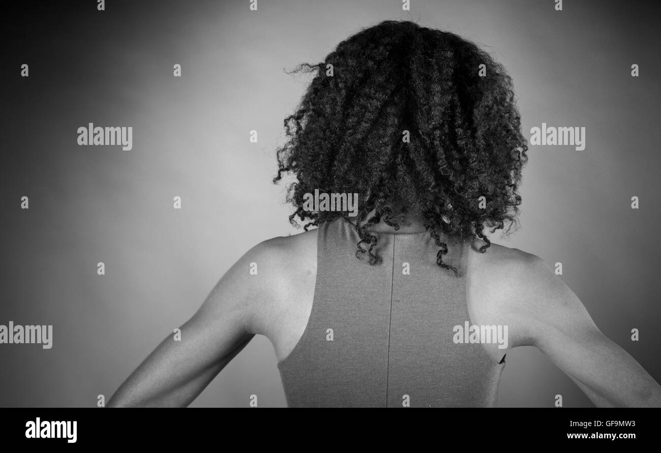 female model attractive woman on plein background with copy space rear ...