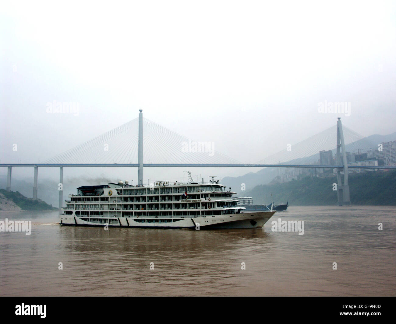 Cruise ship at Badong and the new Badong bridge in the background – on ...