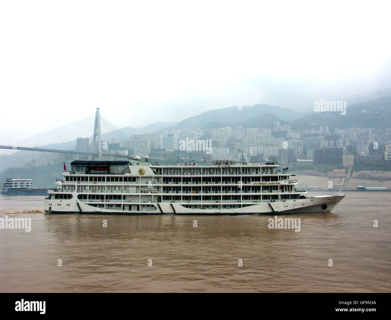 Cruise ship at Badong and the new Badong bridge in the background – on ...