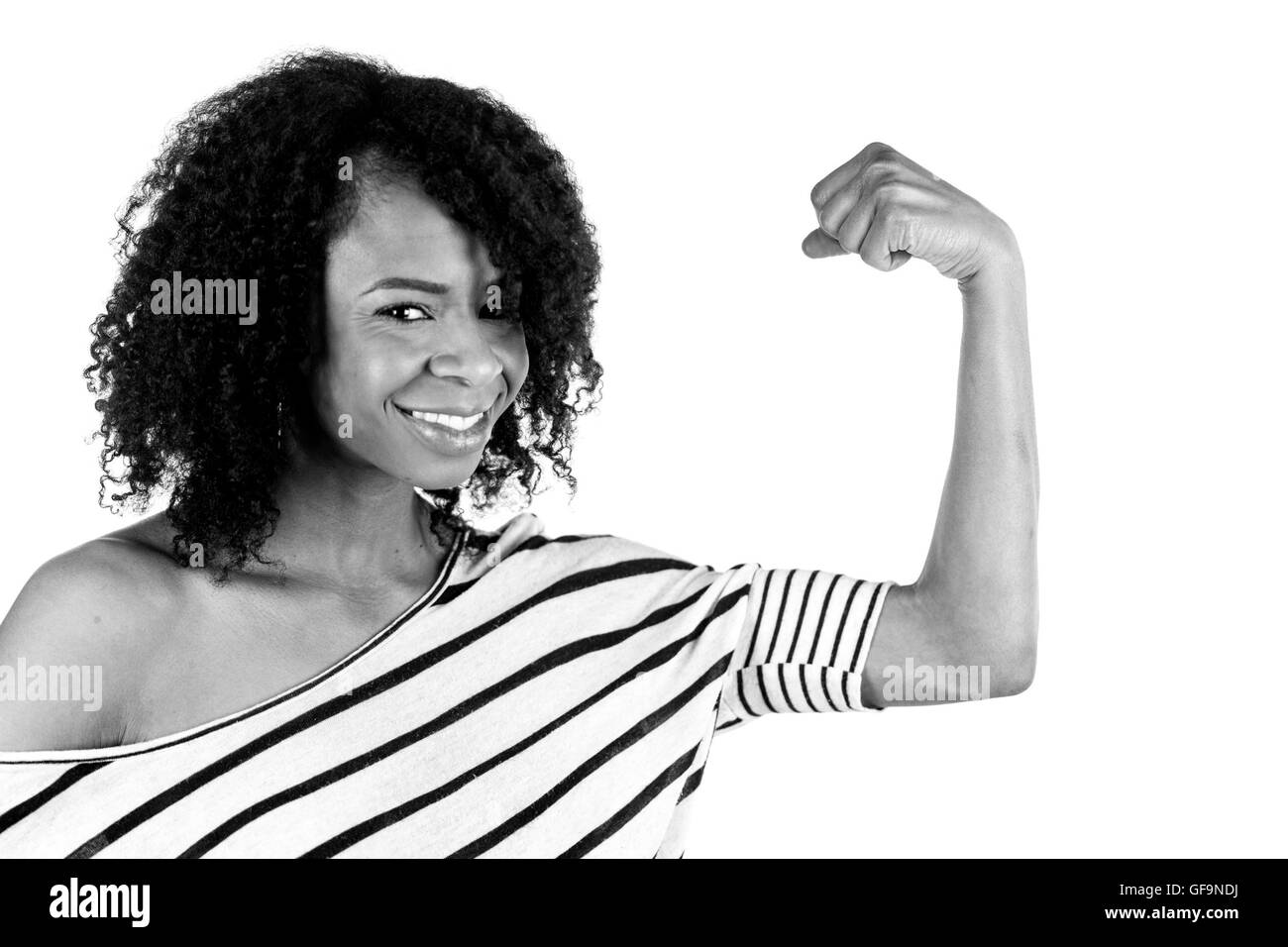 female model attractive woman showing strength with arm curl Stock ...