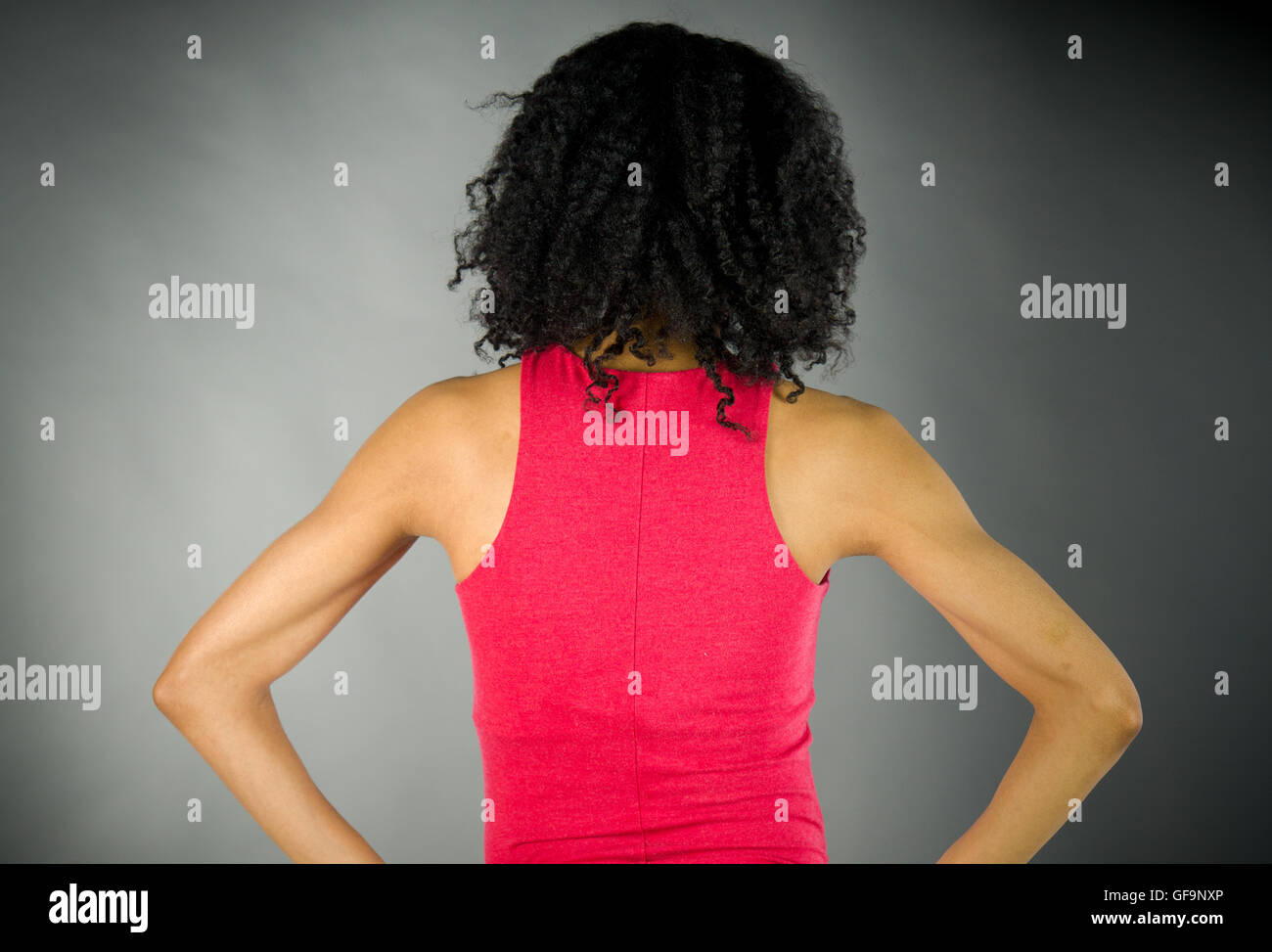 female model attractive woman on plein background with copy space rear ...