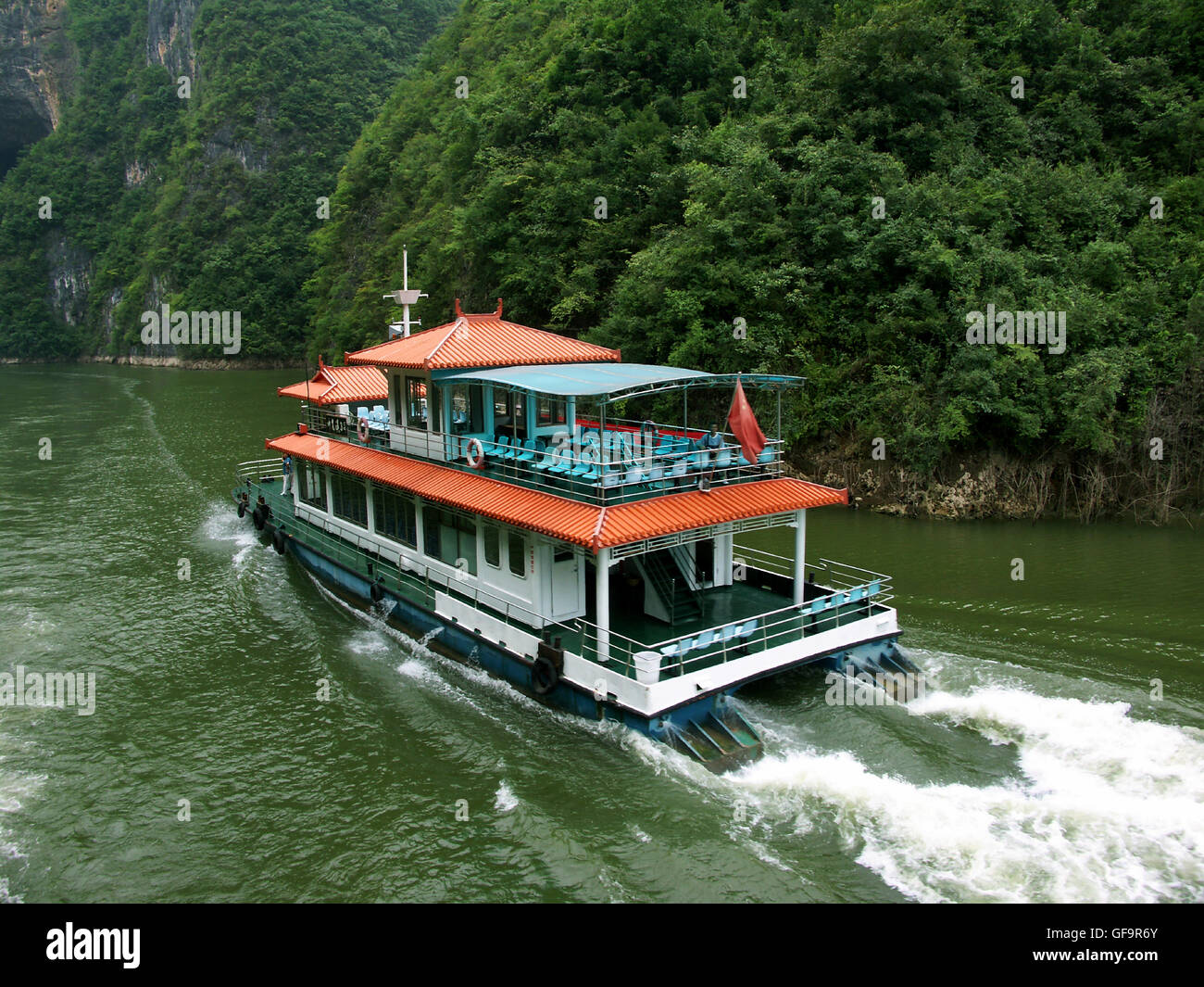 Passing a small tourist boat on Shennong Stream, a tributary of the ...