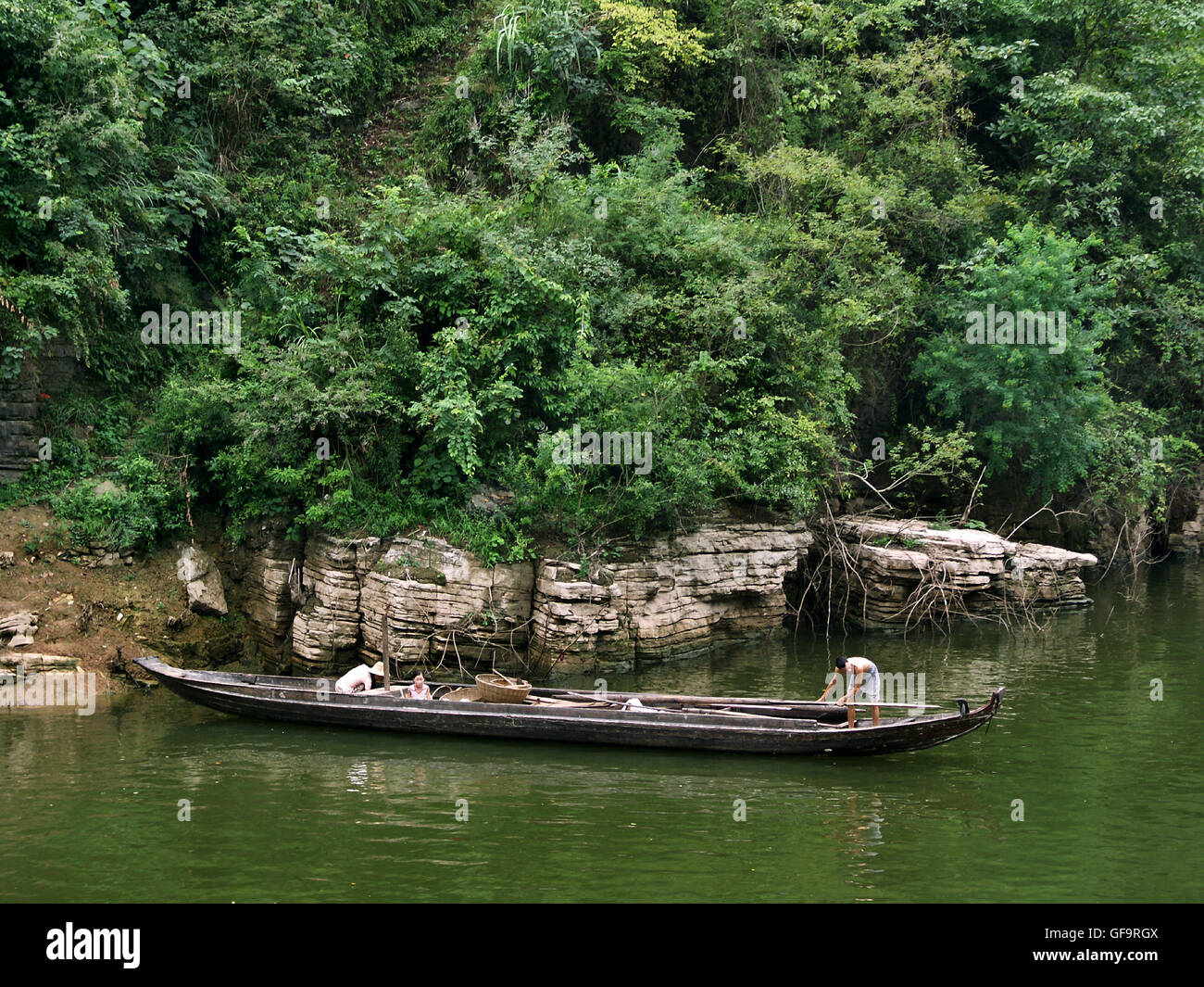 Local boat passing on Shennong Stream, a tributary of the Yangtze River ...