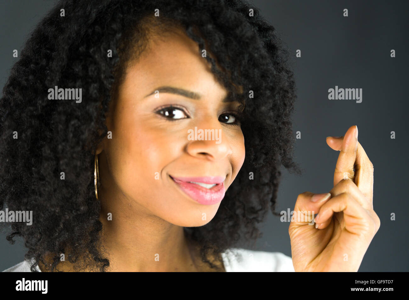 Fingers to head hi-res stock photography and images - Alamy