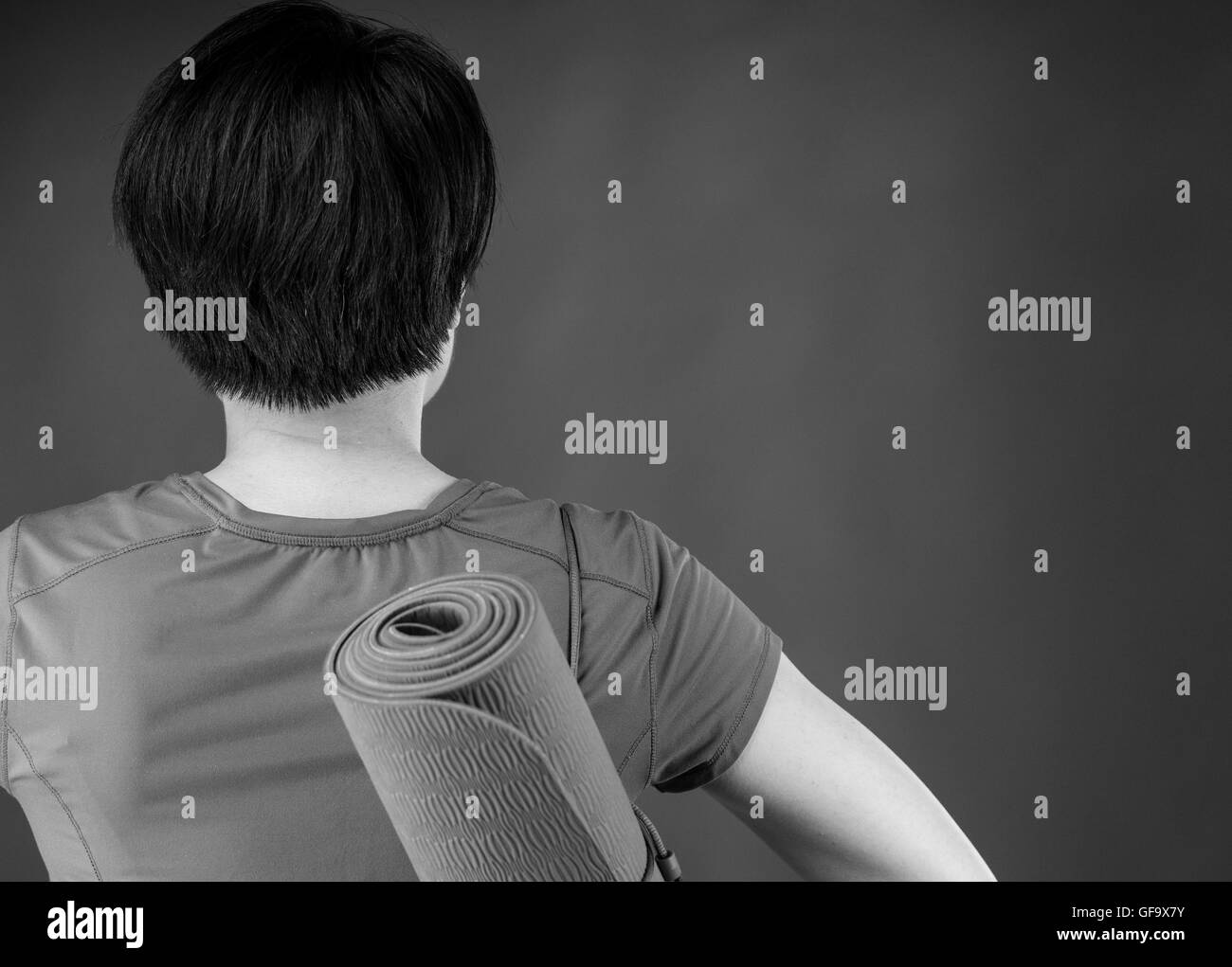 female model attractive woman on plain background with copy space rear ...