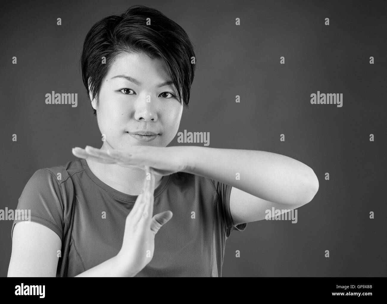 female model attractive woman on plain background with copy space time ...