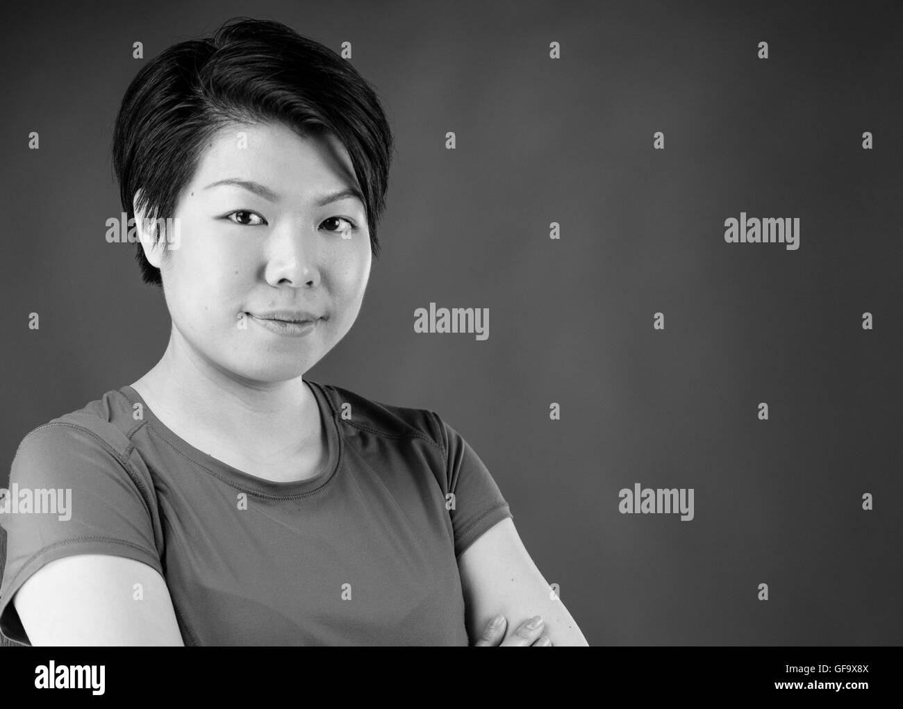 Woman plain background happiness model Black and White Stock Photos ...