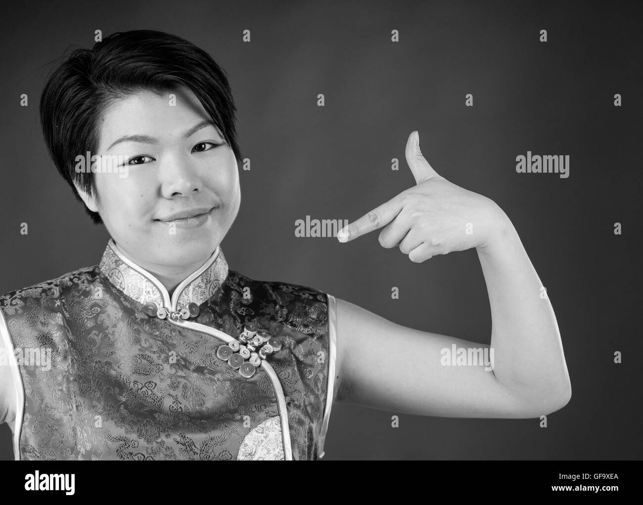 female model attractive woman on plain background with copy space proud ...