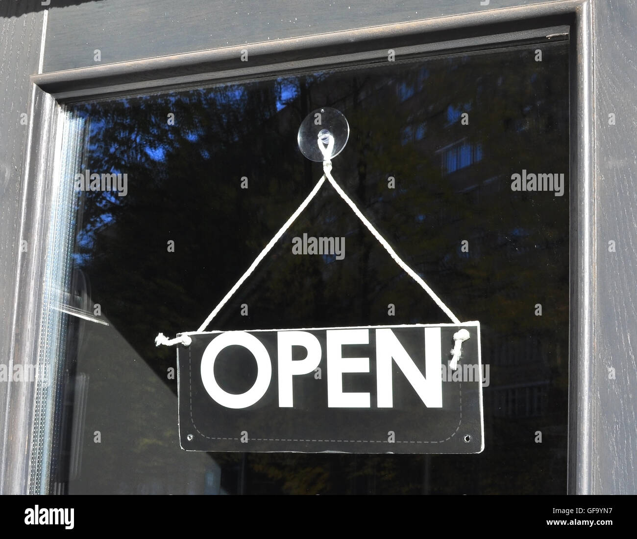 Open sign hanging on the door Stock Photo - Alamy