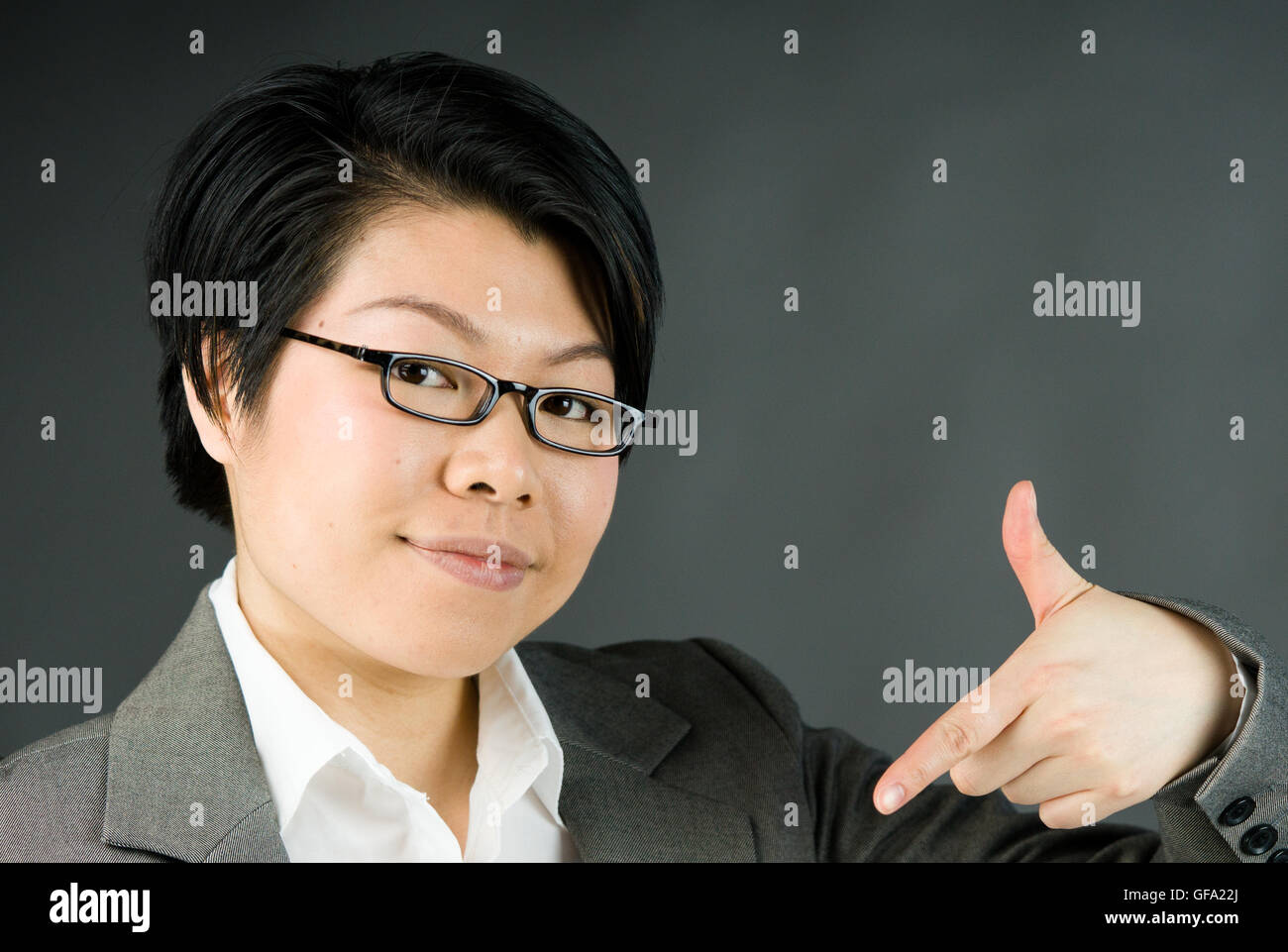 female model attractive woman on plain background with copy space proud ...