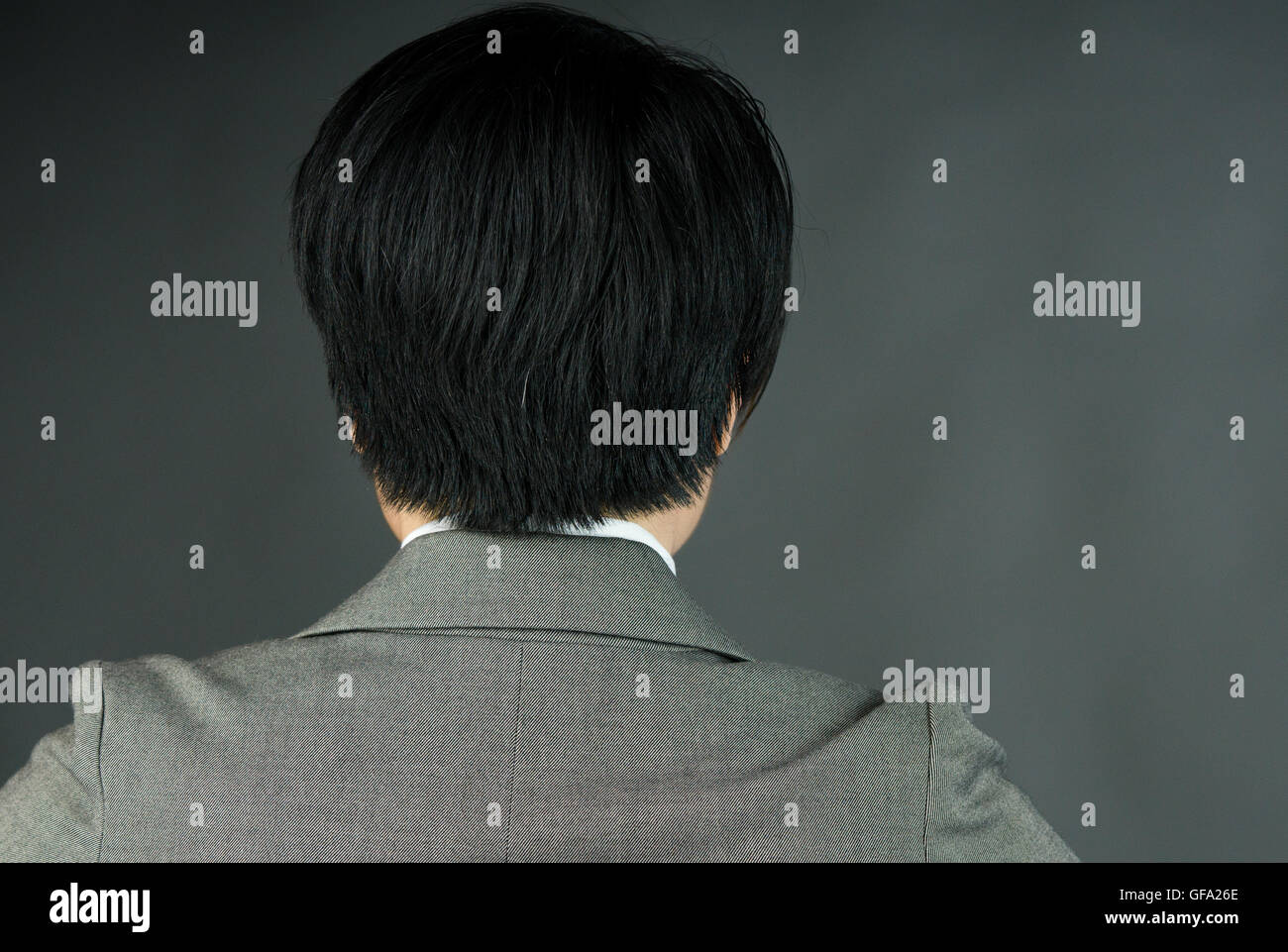 female model attractive woman on plain background with copy space rear ...