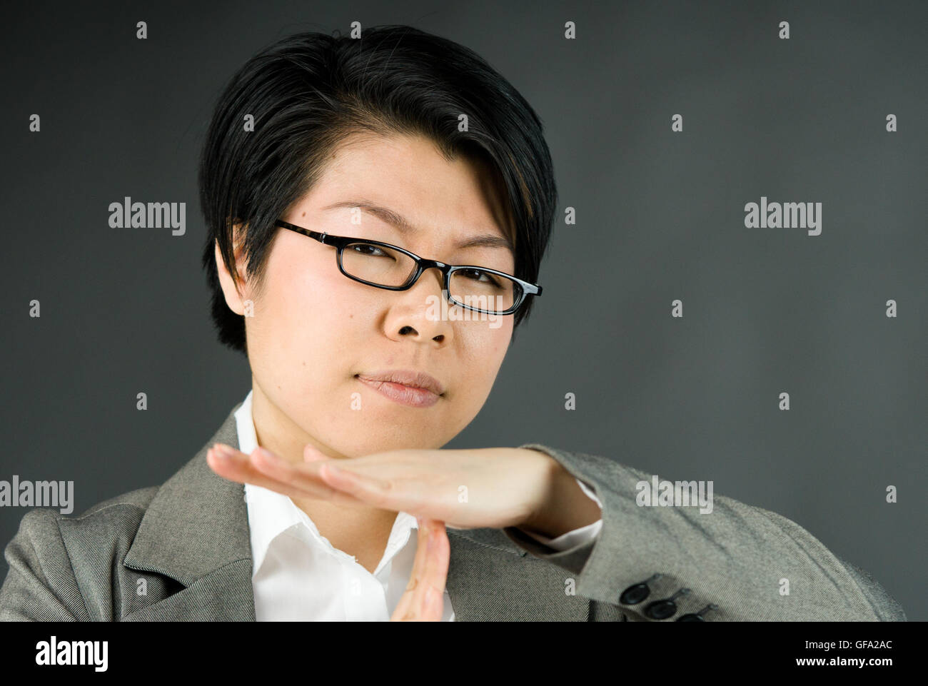 female model attractive woman on plain background with copy space time ...