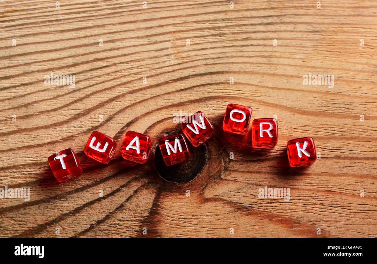 red dices with TEAMWORK word Stock Photo - Alamy