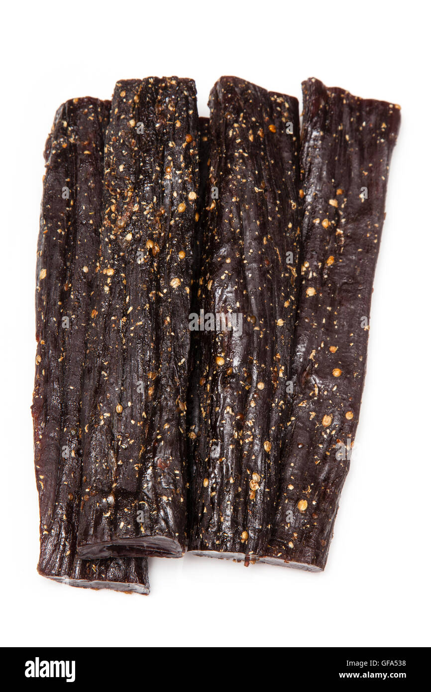 Beef Biltong sticks isolated on a white studio background Stock Photo ...