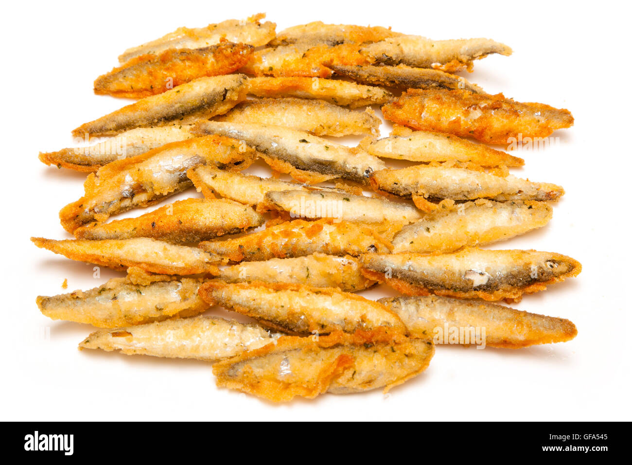 Battered whitebait sprats (Sprattus sprattus) isolated on a white ...