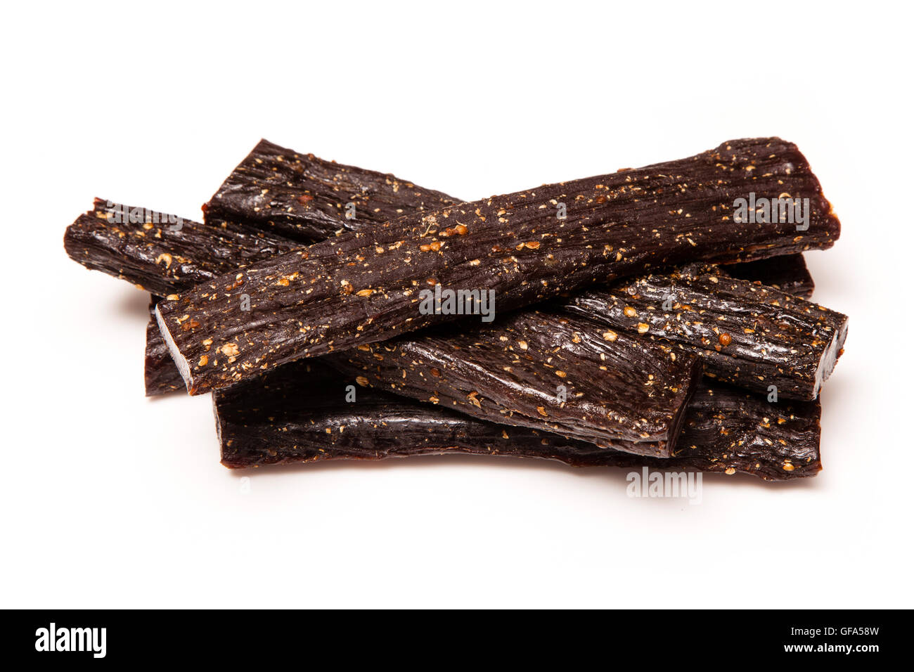 Beef Biltong sticks isolated on a white studio background Stock Photo ...