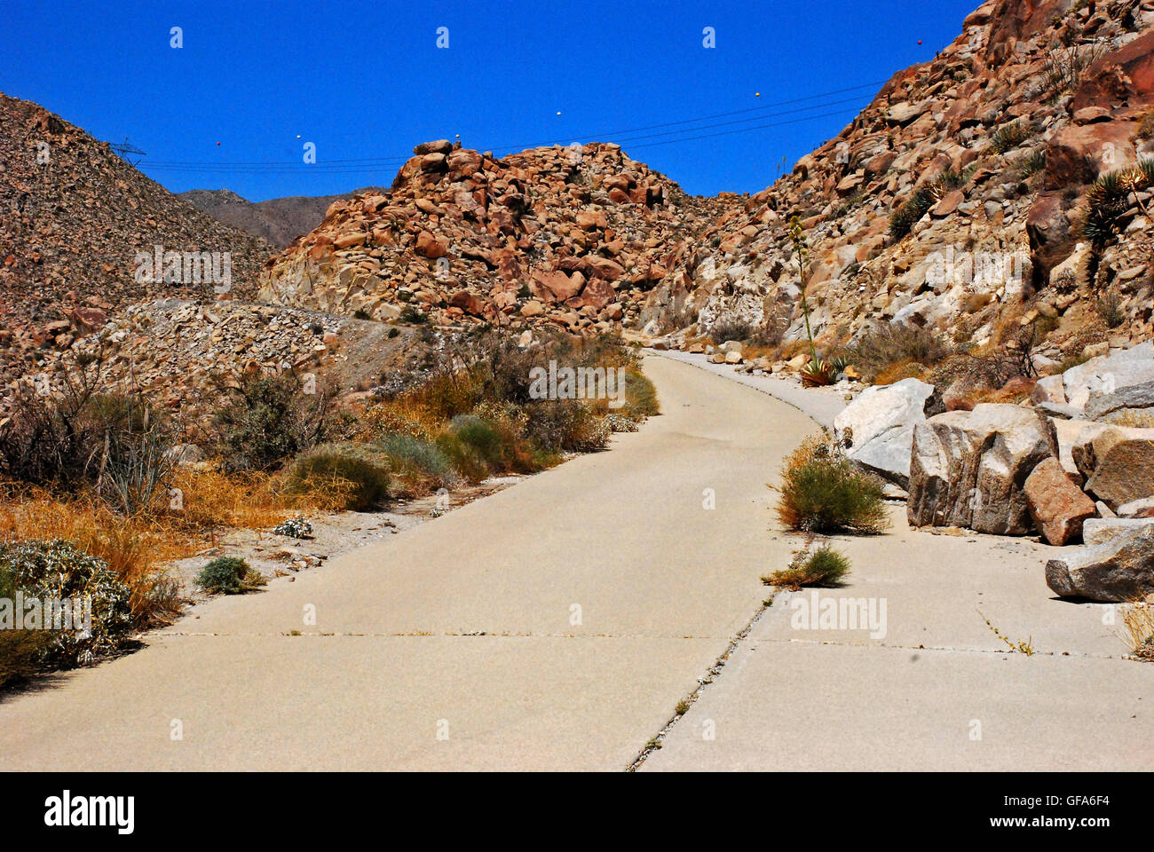 Ruins of old desert highway through mountains Stock Photo - Alamy
