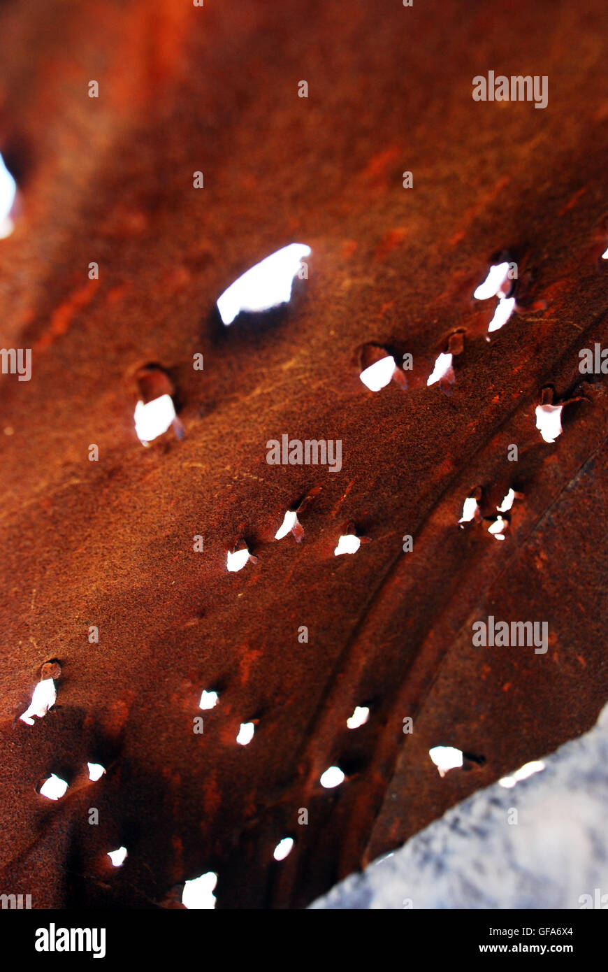 Rusty metal torn holes hi-res stock photography and images - Alamy