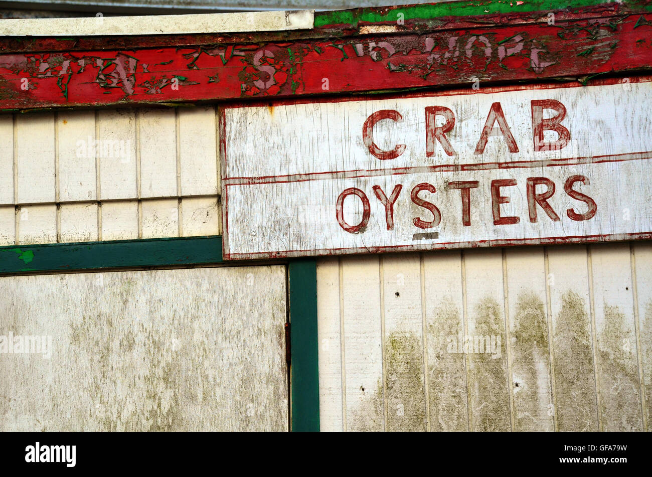 Sign for crab and oysters at port shop Stock Photo - Alamy