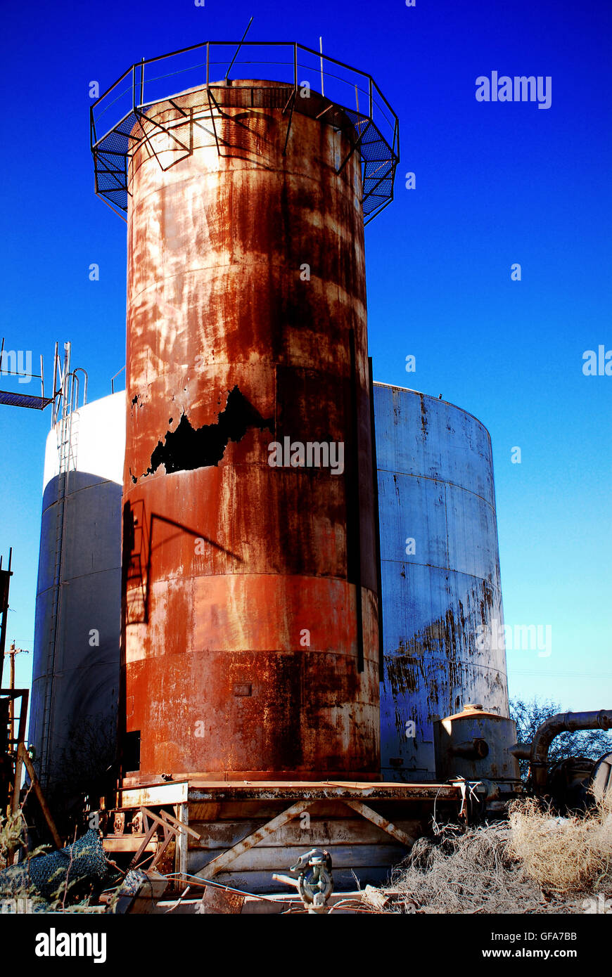 Rusty factory silo Stock Photo - Alamy