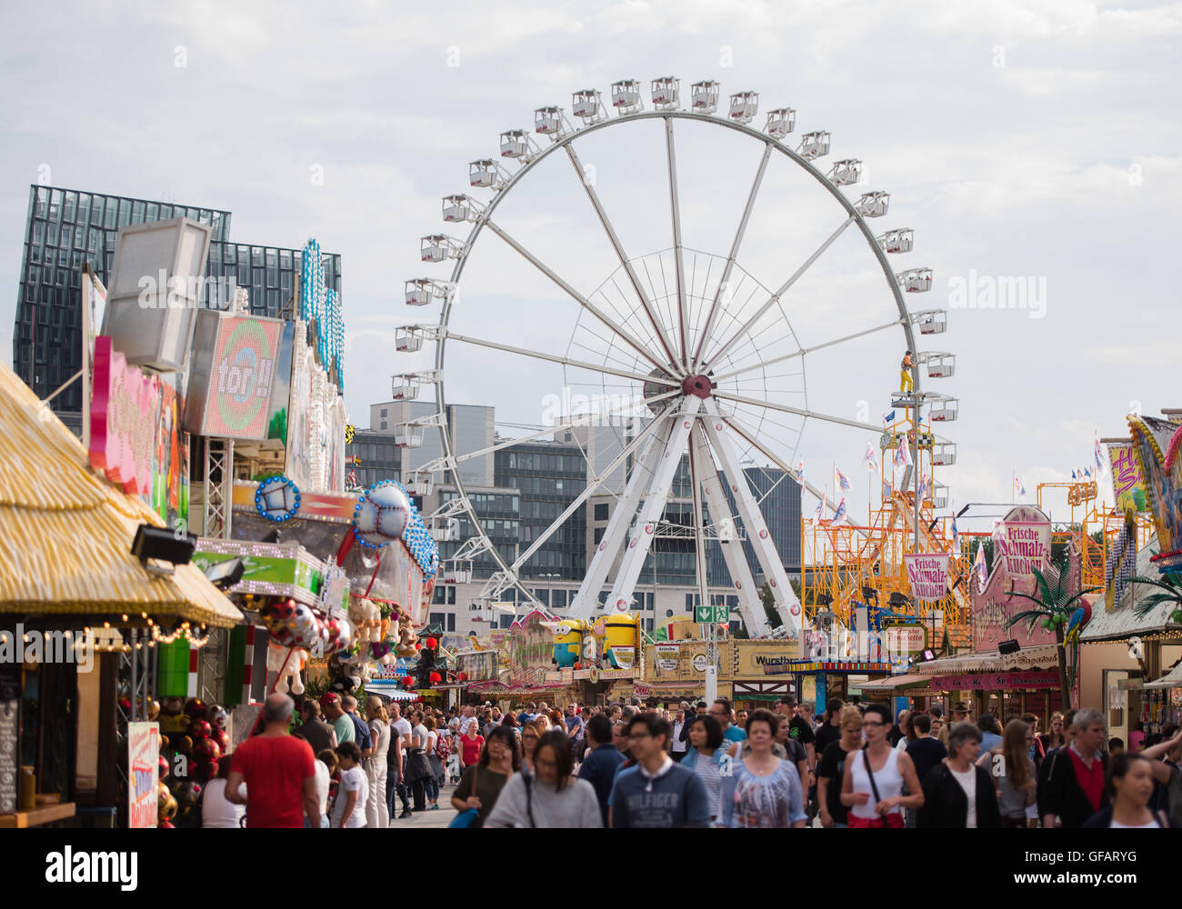 Visitors walk across Heiligengeistfeld at the start of the Sommerdom ...