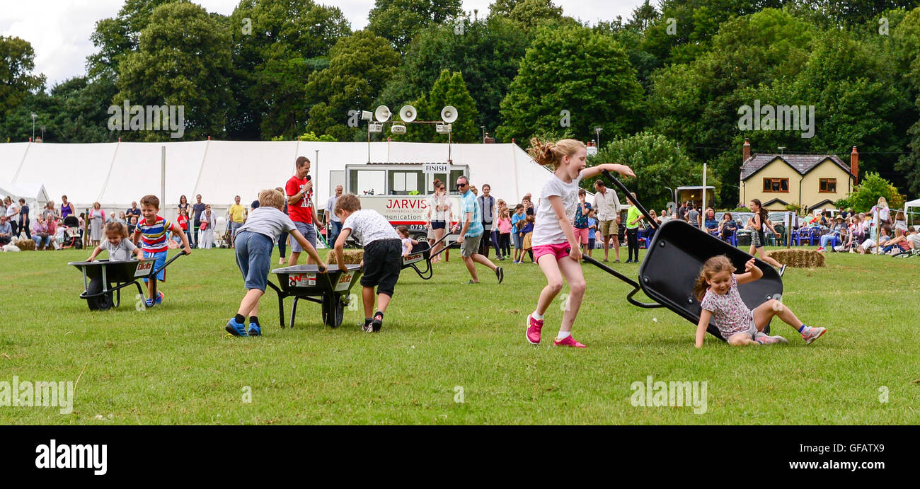 Wheelbarrow race High Resolution Stock Photography and Images - Alamy