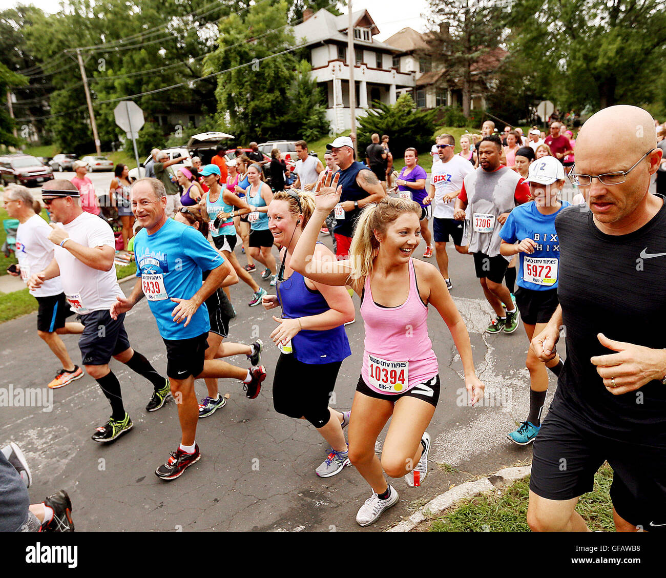 Davenport, Iowa, USA. 30th July, 2016. Runners on Kirkwood Blvd. during ...