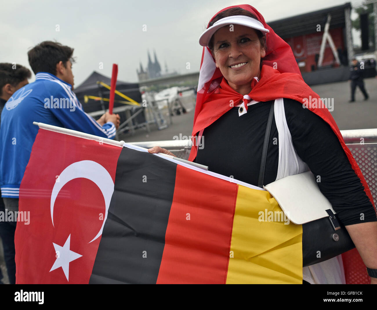 Cologne, Germany. 31st July, 2016. A supporter of Turkish President ...