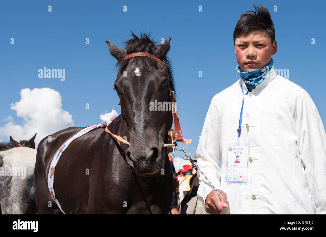 Shiqu, China's Sichuan Province. 31st July, 2016. A Tibetan young man ...