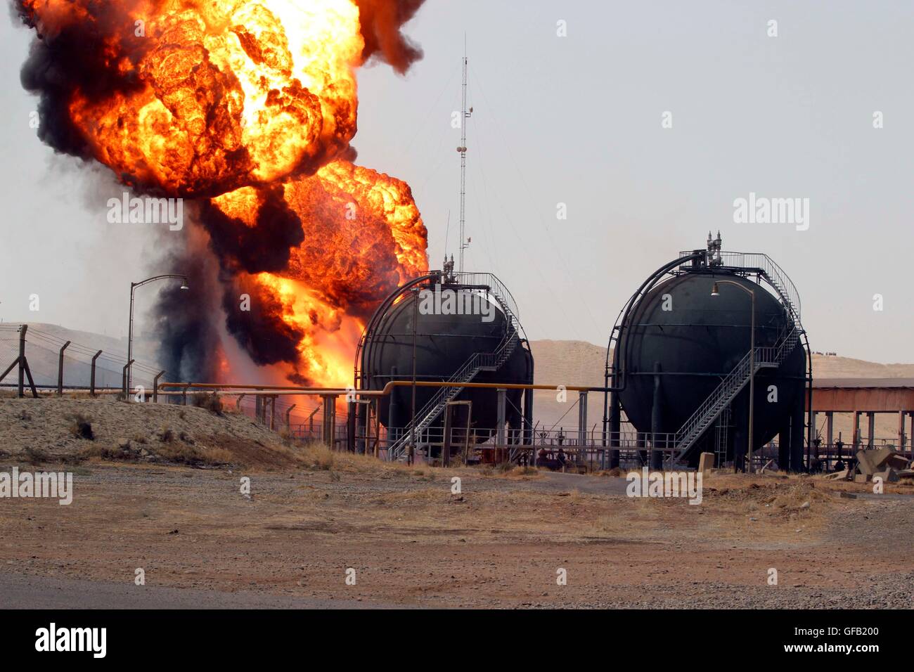 Kirkuk, Iraq, 31st July, 2016. Huge fire rises from a fuel tank after ...
