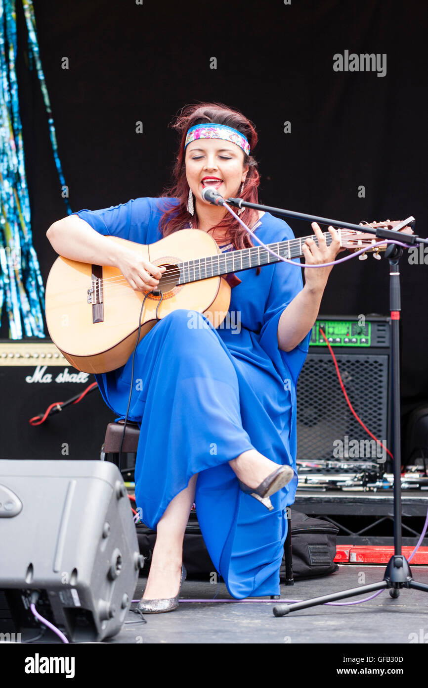 Columbian songwriter, singer and guitarist, Carolina Herrera in blue ...