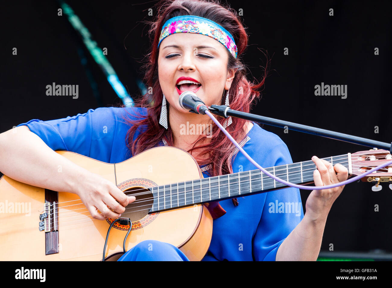 Columbian songwriter, singer and guitarist, Carolina Herrera in blue ...