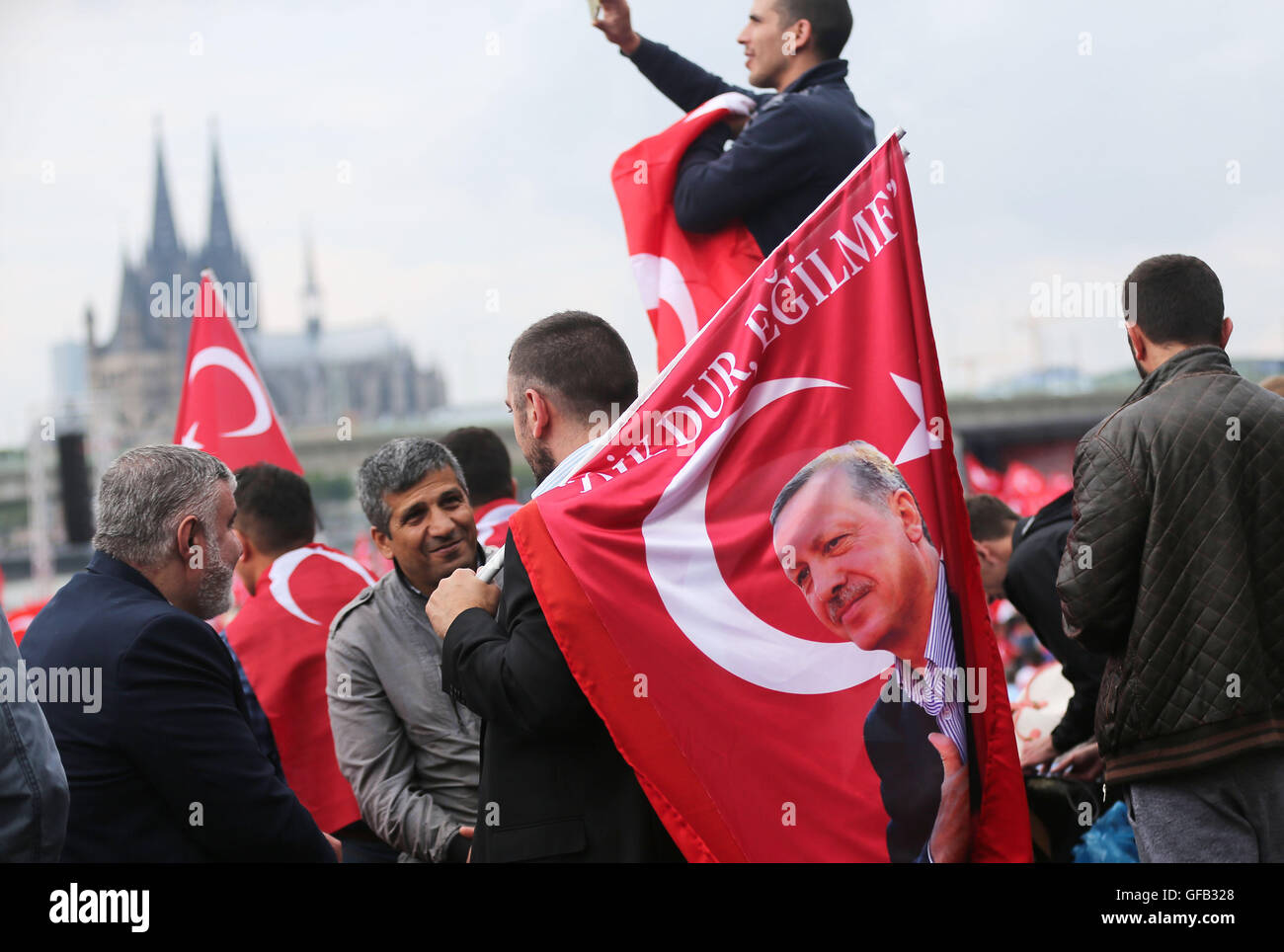 Cologne, Germany. 31st July, 2016. People with the Turkish flag are at ...