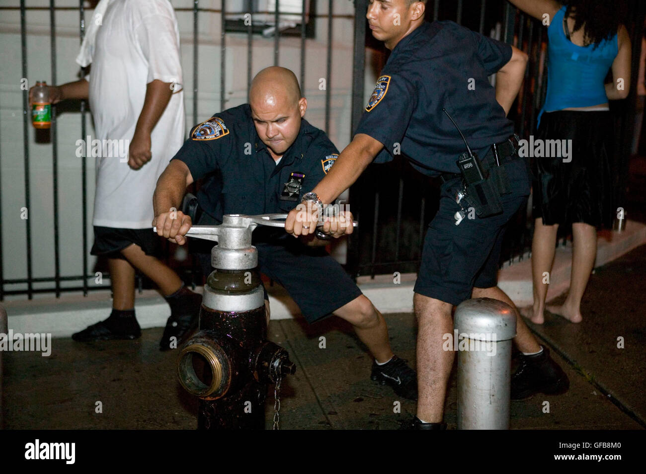 NYPD police officers shut down an illegally opened fire hydrant in ...